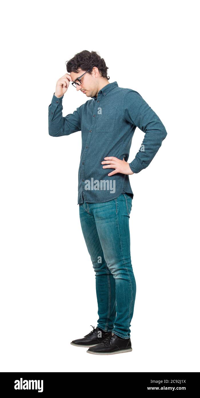 Side view full length portrait, pensive businessman keeps hand to ... Side view full length portrait, pensive businessman keeps hand to ...