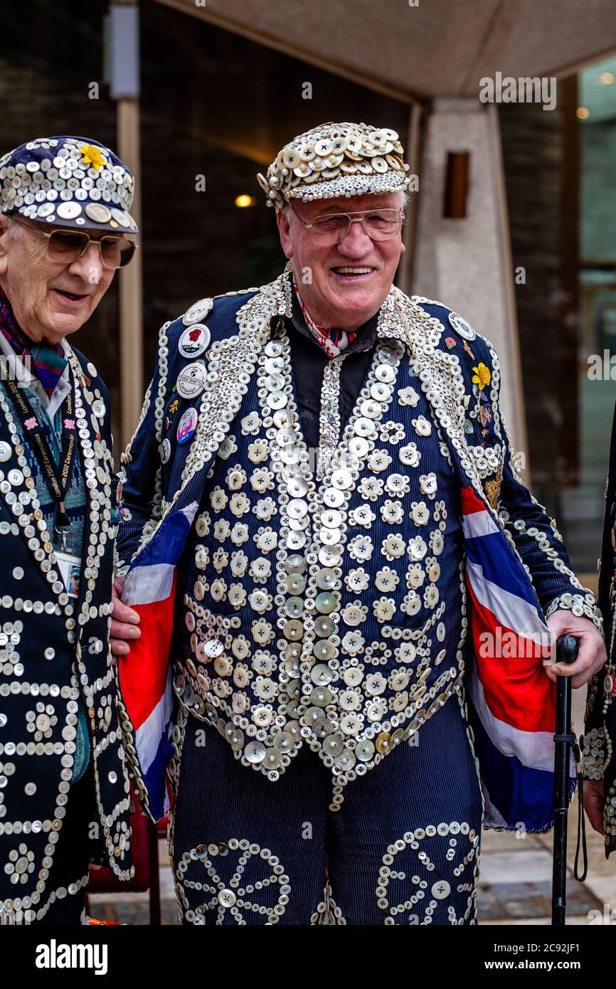 A Group Of Pearly Kings In Traditional Costume Pose For A Photo At The ...