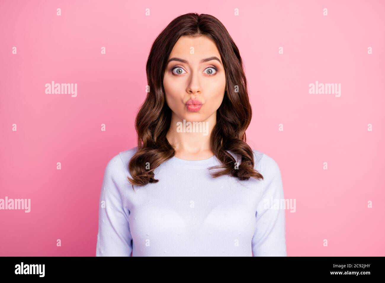 Closeup photo of attractive pretty lady wavy hairdo sending air kisses ...