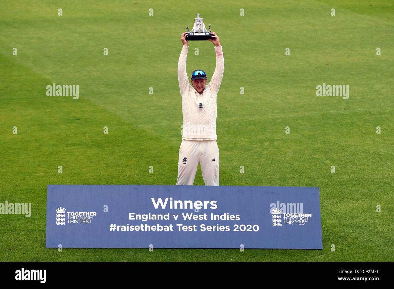 England's Joe Root celebrates their series victory with the Wisden ...