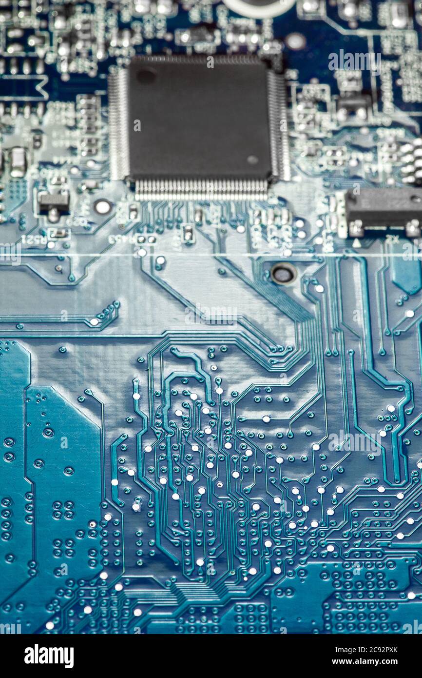 Electronic blue circuit board with processor, cpu on contact legs close ...