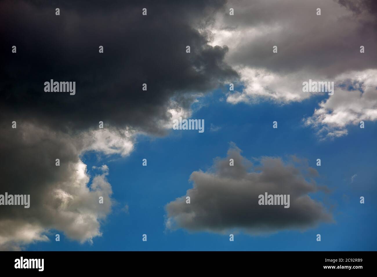 Storm clouds light and dark before a rain Stock Photo - Alamy