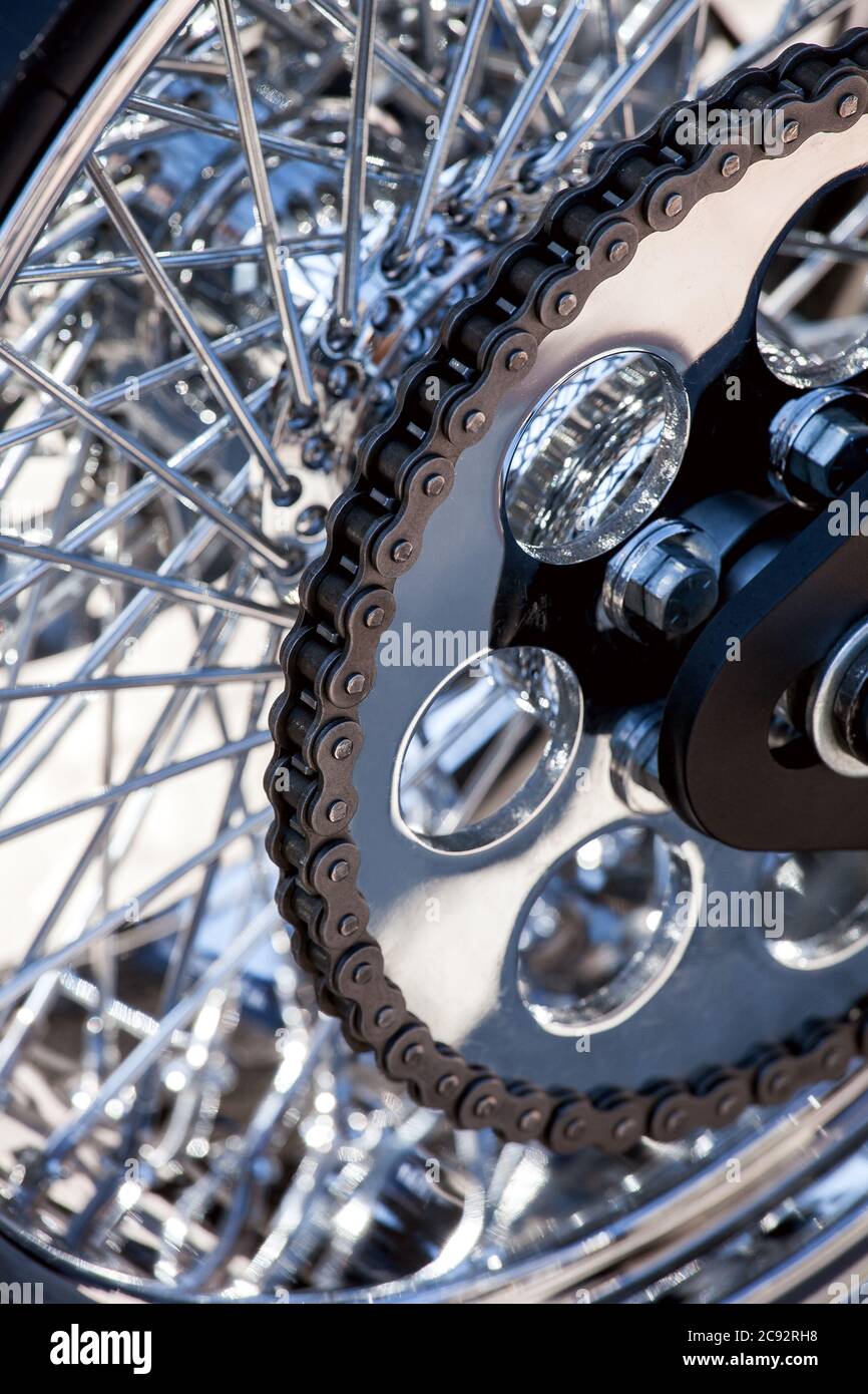 motorcycle chain on a back wheel with chromic spokes, deteil motocycle ...