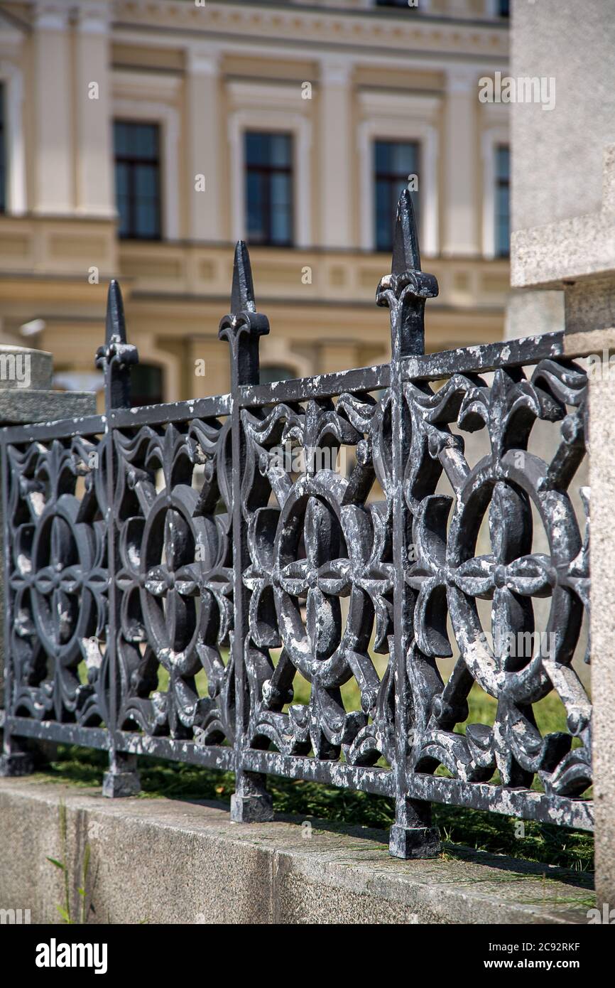 The old forged fence of black color, dirty protection nobody Stock ...