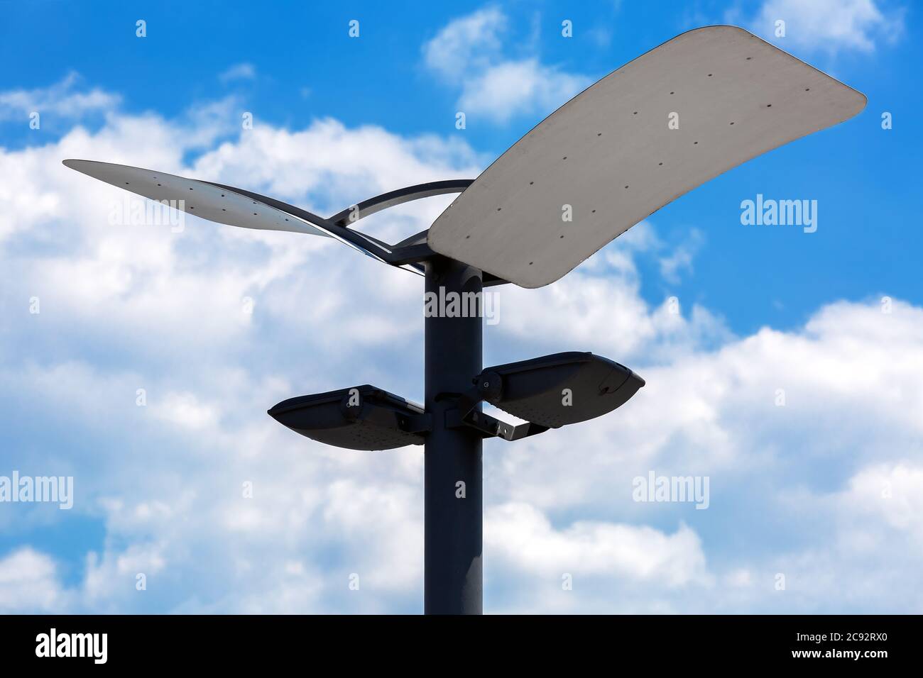 The streetlight lantern is black with a spotlight and a diffuse light ...