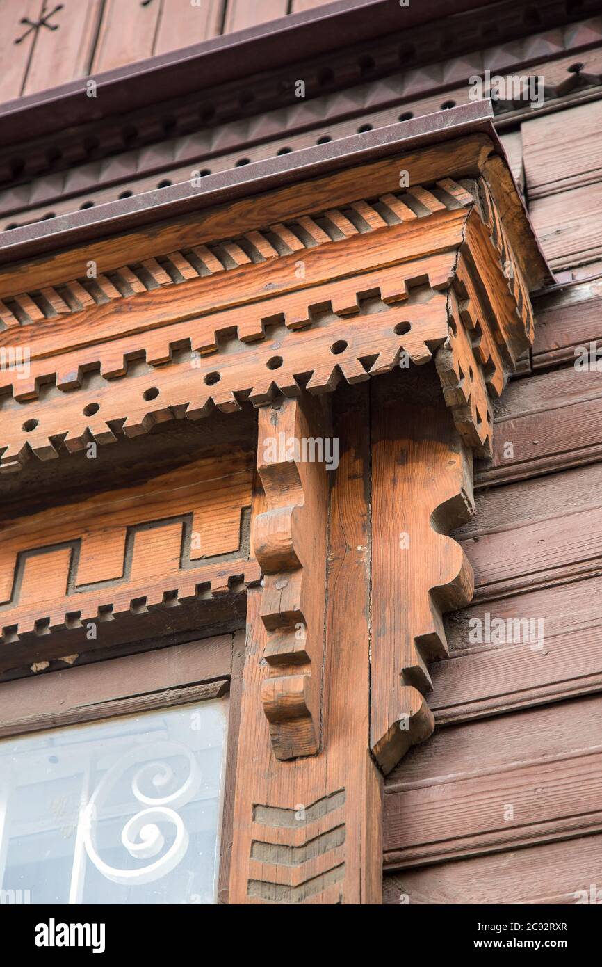 Details of wood carving of a window frame, a close-up of a traditional ...