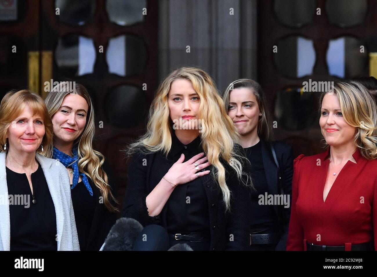 Amber heard and her sister whitney heard hi-res stock photography and ...