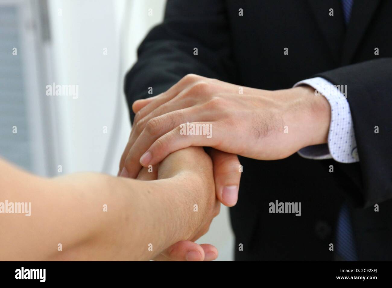 close up business man handshake with new partner. the manager handshake ...