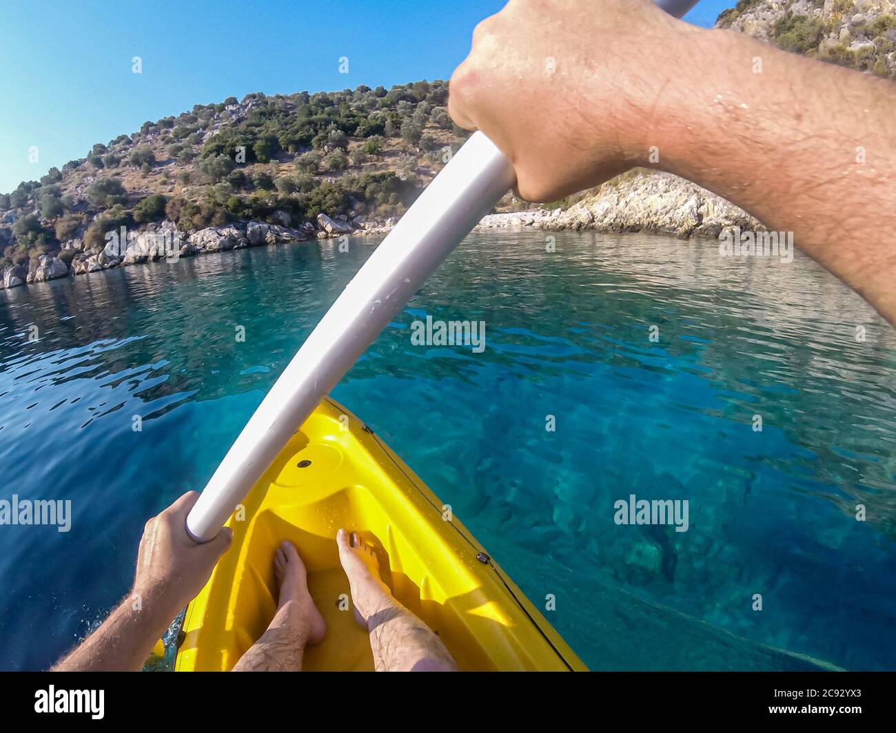 colorful yellow kayak at blue sea water during summer vacation Stock ...