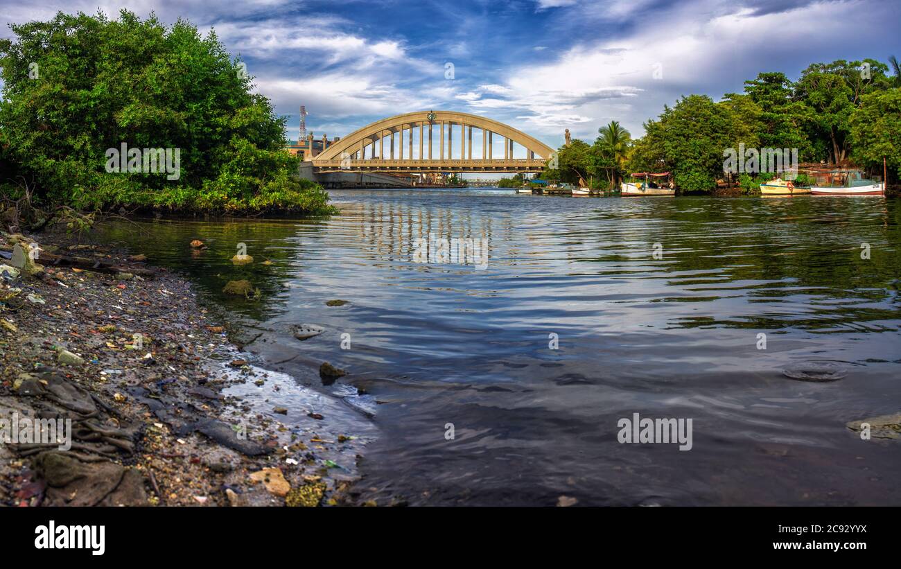 Bridge in Matanzas, Cuba seen through a polluted coast Stock Photo - Alamy