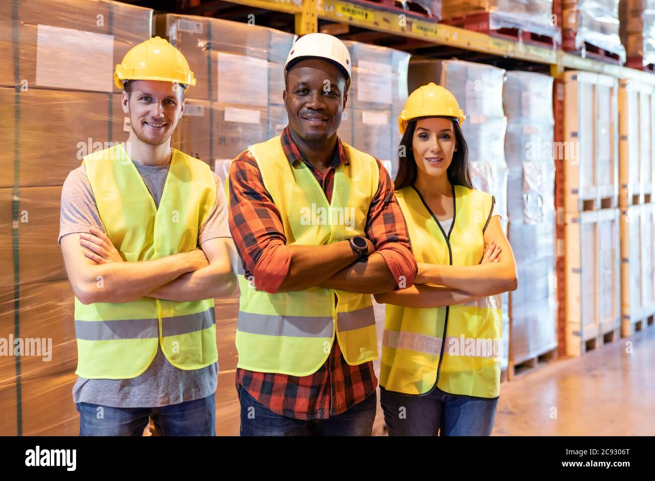 Portrait african black warehouse supervisor stand and crossed his arms ...