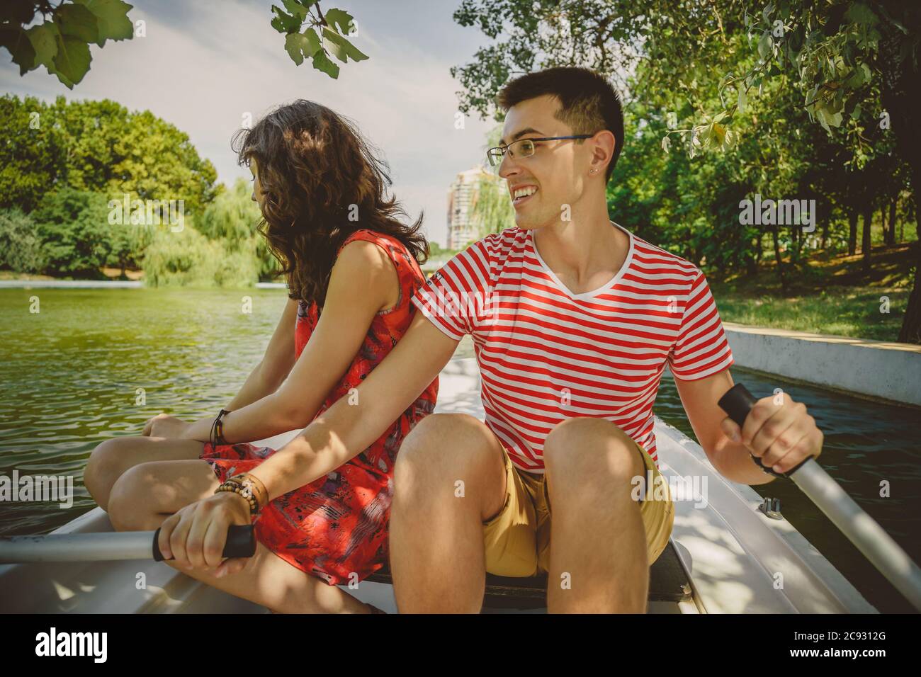 Romantic couple in rowing boat hi-res stock photography and images - Alamy