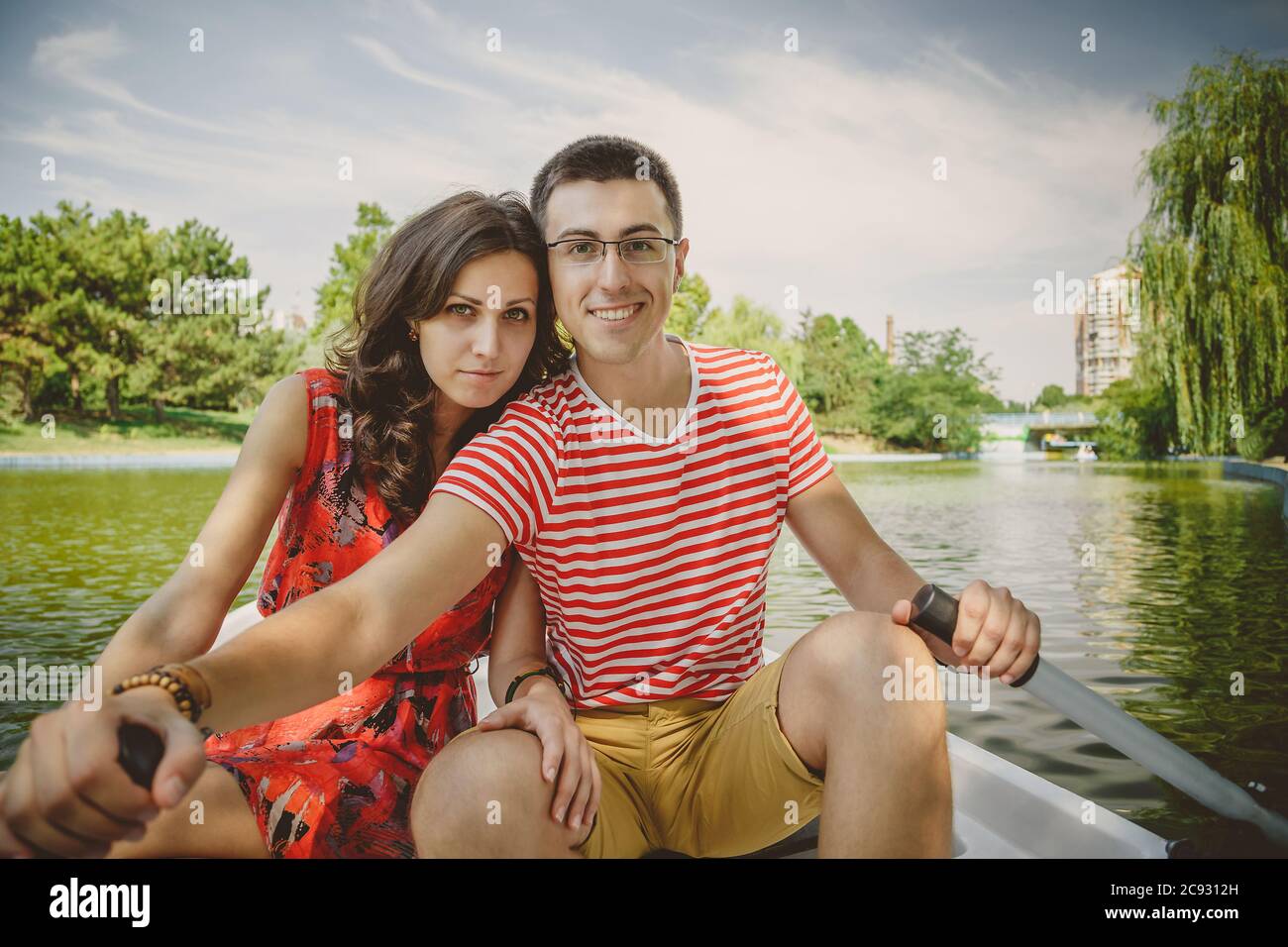 Romantic couple in row boat hi-res stock photography and images - Alamy