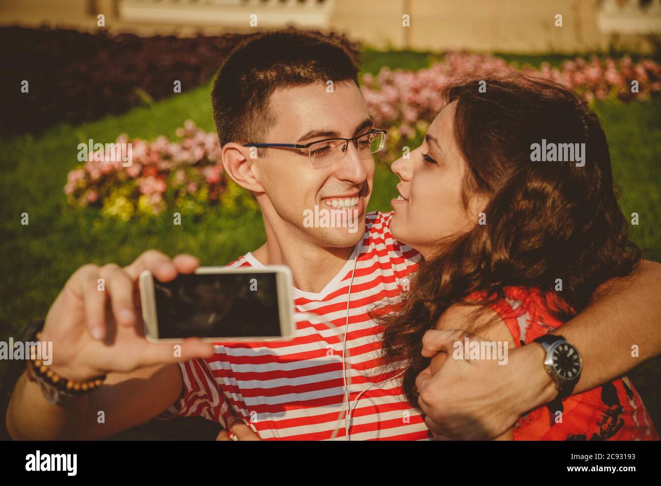 Mobile hugging hi-res stock photography and images - Alamy