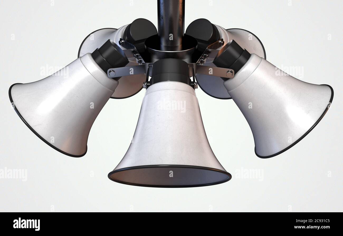 An array of five horn loudspeakers hanging off a pole in a circle ...
