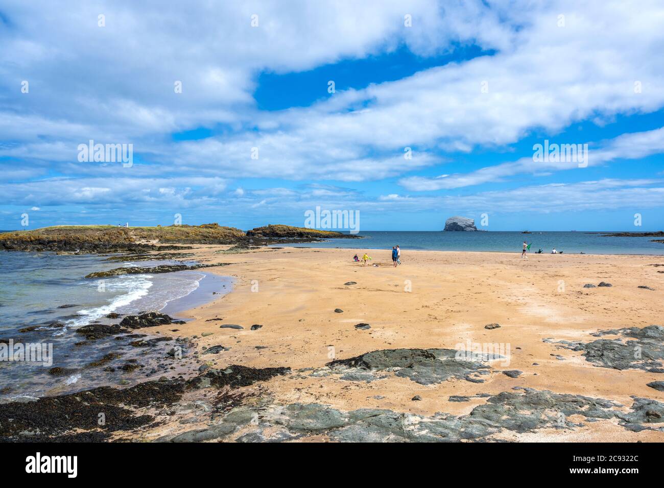 Sand spit at east end of Milsey Bay North Berwick with Bass Rock in ...