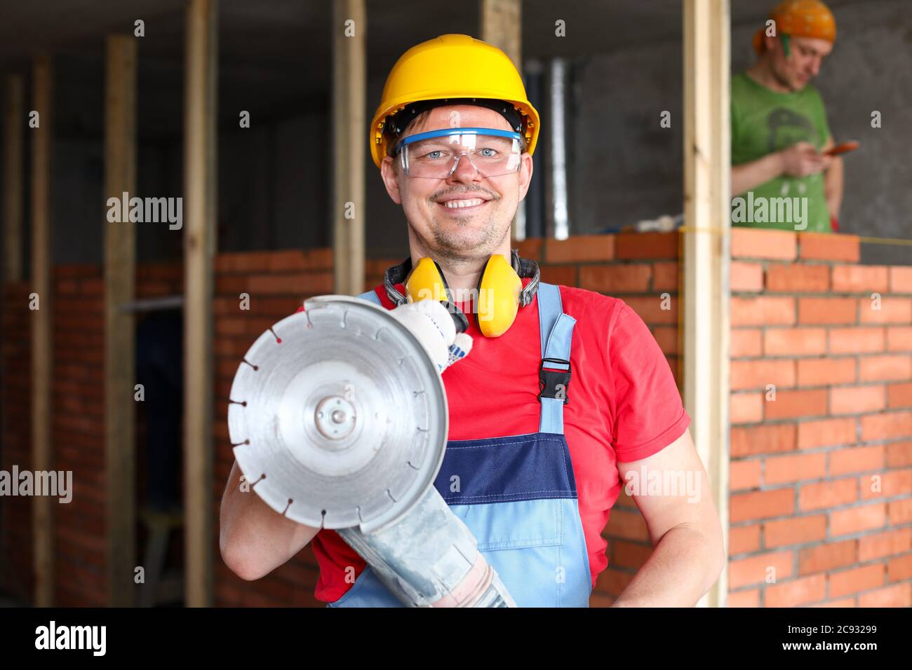 Portrait happy builder holding hi-res stock photography and images - Alamy
