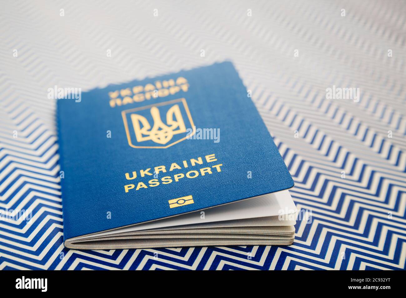 Close up of new ukrainian blue international biometric passport with ...