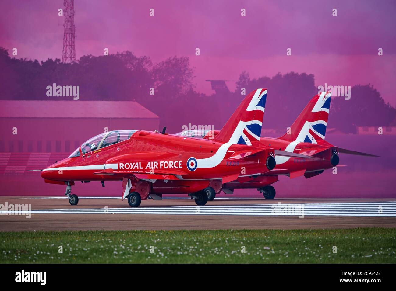Red Arrows Hawks lined up for take off - smoke on Stock Photo - Alamy