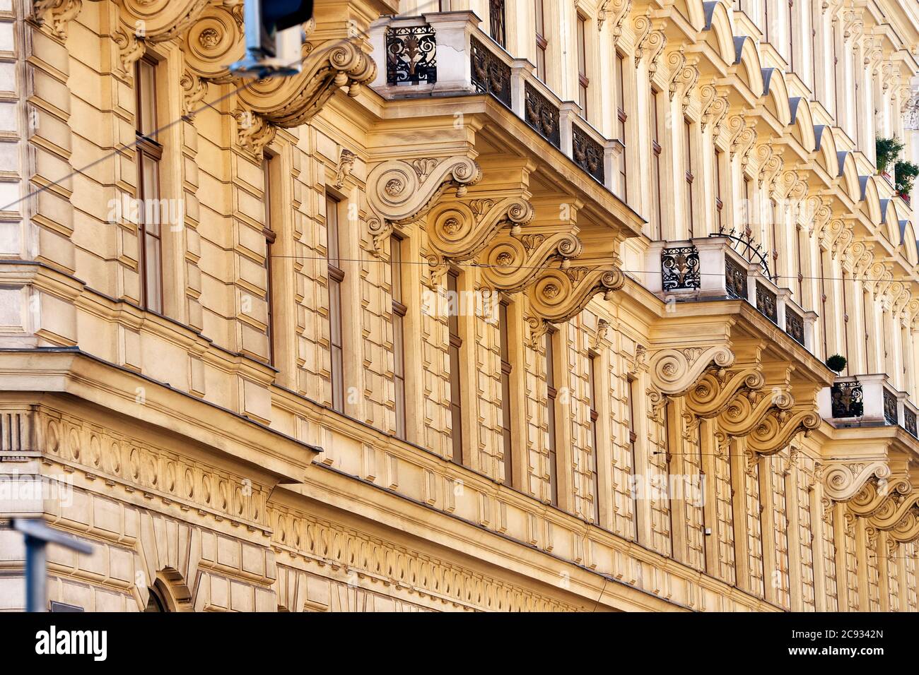 The facade of a baroque building in Vienna, Austria is decorated with ...