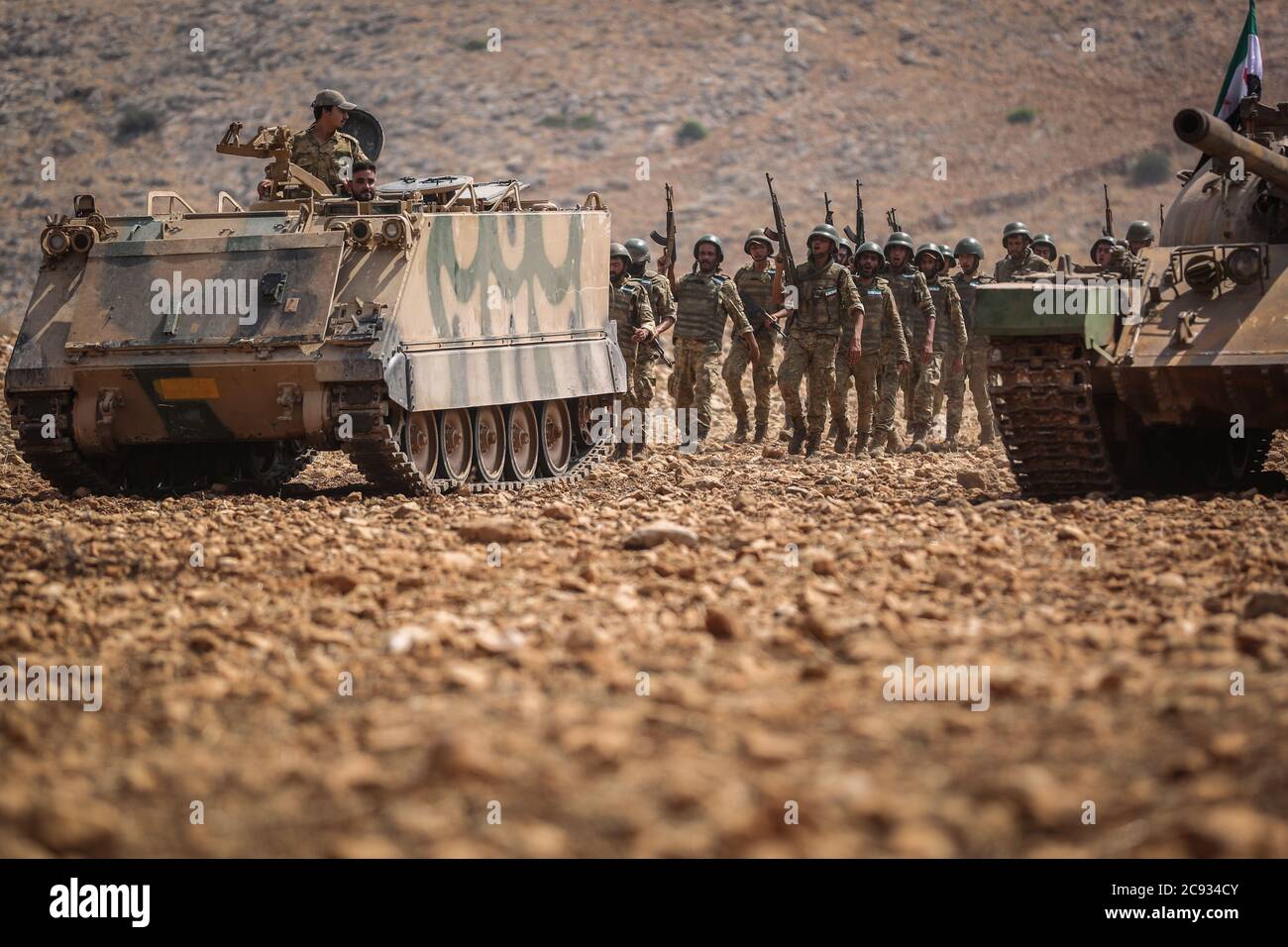 28 July 2020, Syria, Ghazawiya: Members of a special force group of the ...
