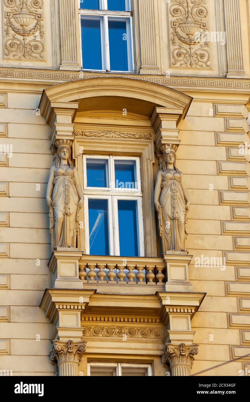 The facade of a baroque building in Vienna, Austriais decorated with ...