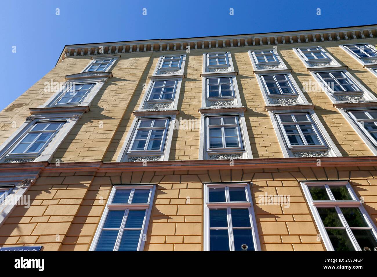 Facade of buildings with traditional architecture in Vienna, Austria ...