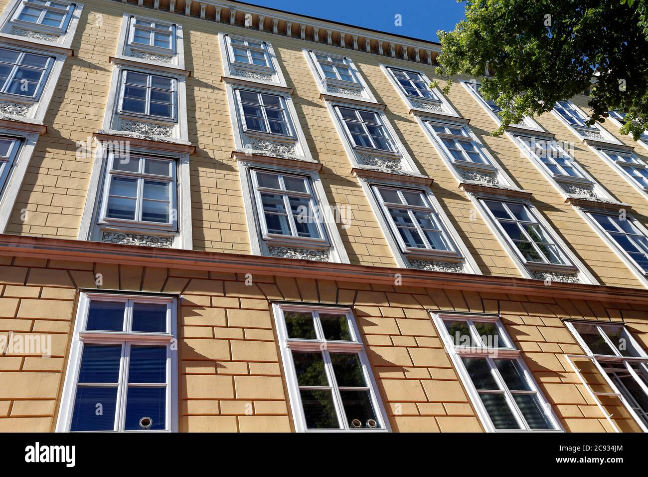 Facade of buildings with traditional architecture in Vienna, Austria ...