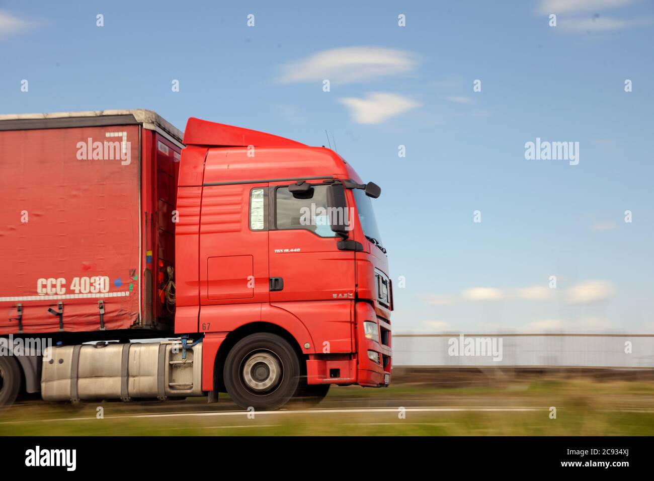 European MAN truck pulling a curtainsider trailer on the A628 Woodhead ...