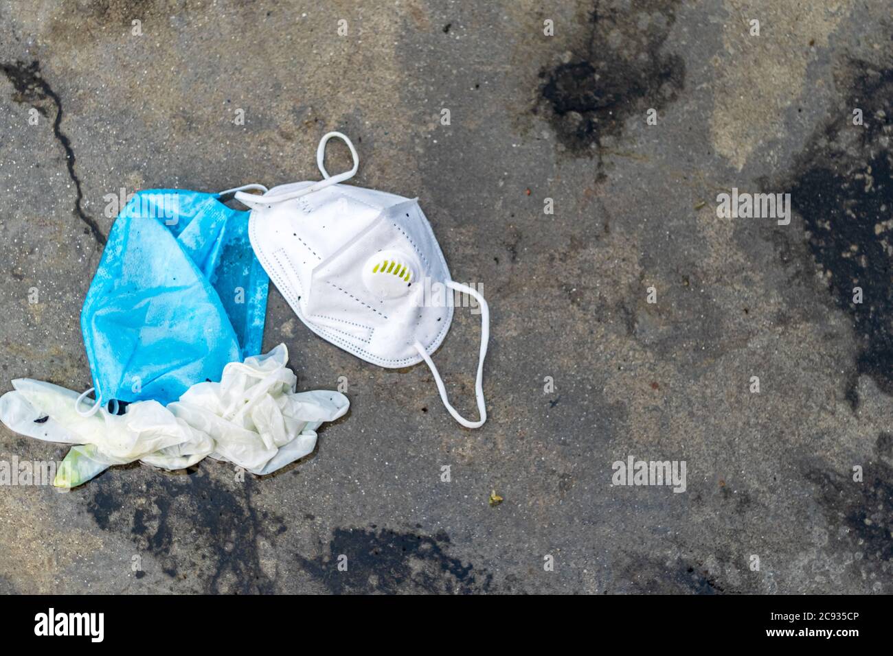 COVID-19 Waste or Litter Concept. Discarded Gloves, Medical Face Mask ...