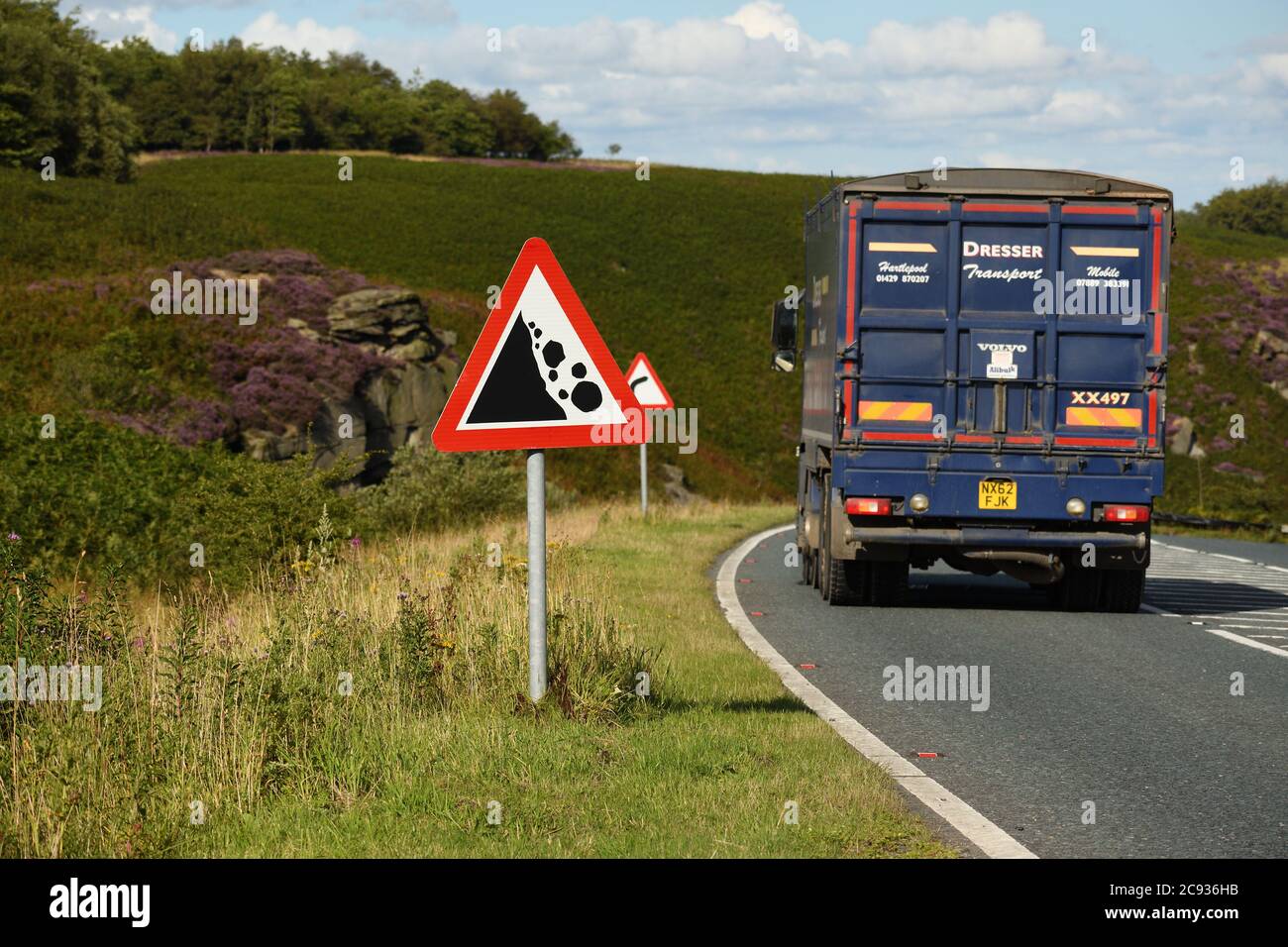 Falling rocks and tight bends chevrons on a rural A-road in North ...
