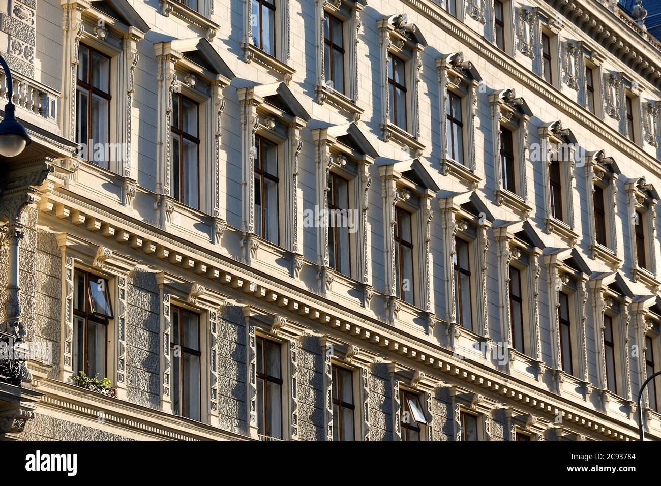 The facade of a baroque building in Vienna, Austria is decorated with ...