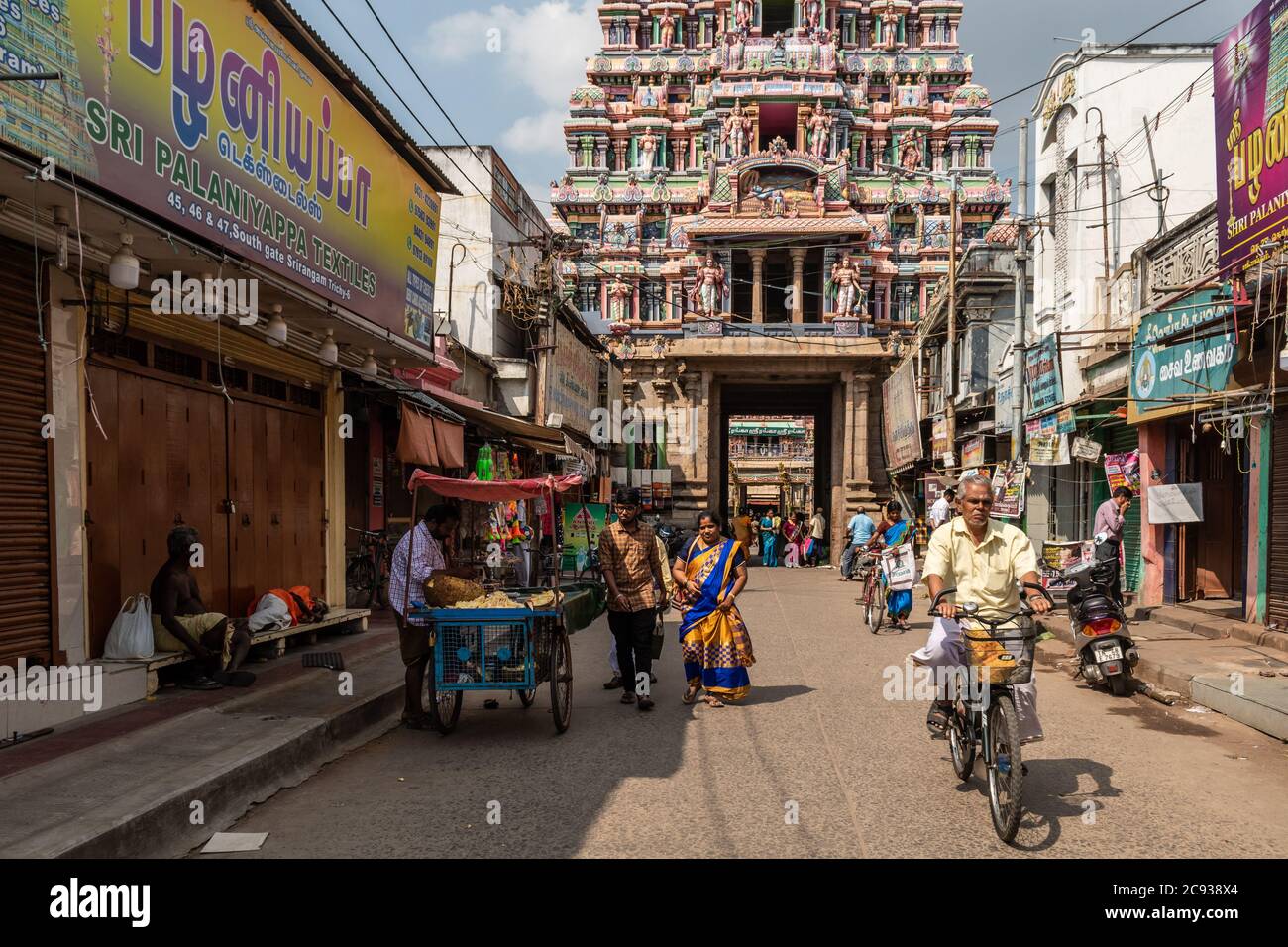 Trichy, Tamil Nadu, India - February 2020: A man cycling through the ...