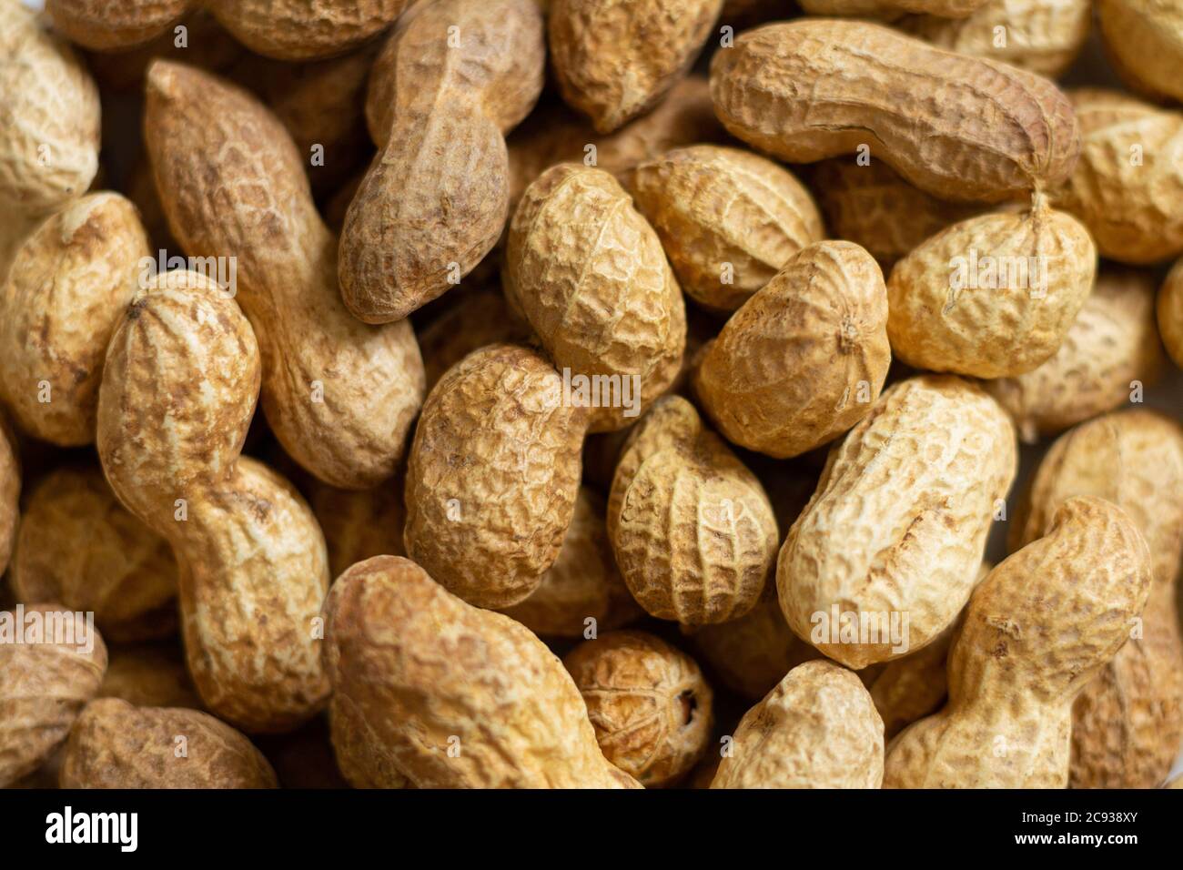 Texture of peanuts in shell. Organic groundnuts background Stock Photo ...