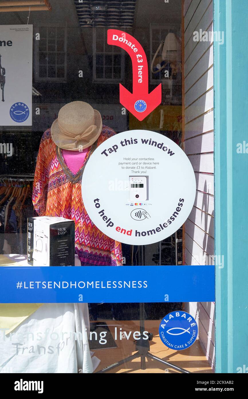 Contactless donation facility in the window of an Alabare charity shop ...
