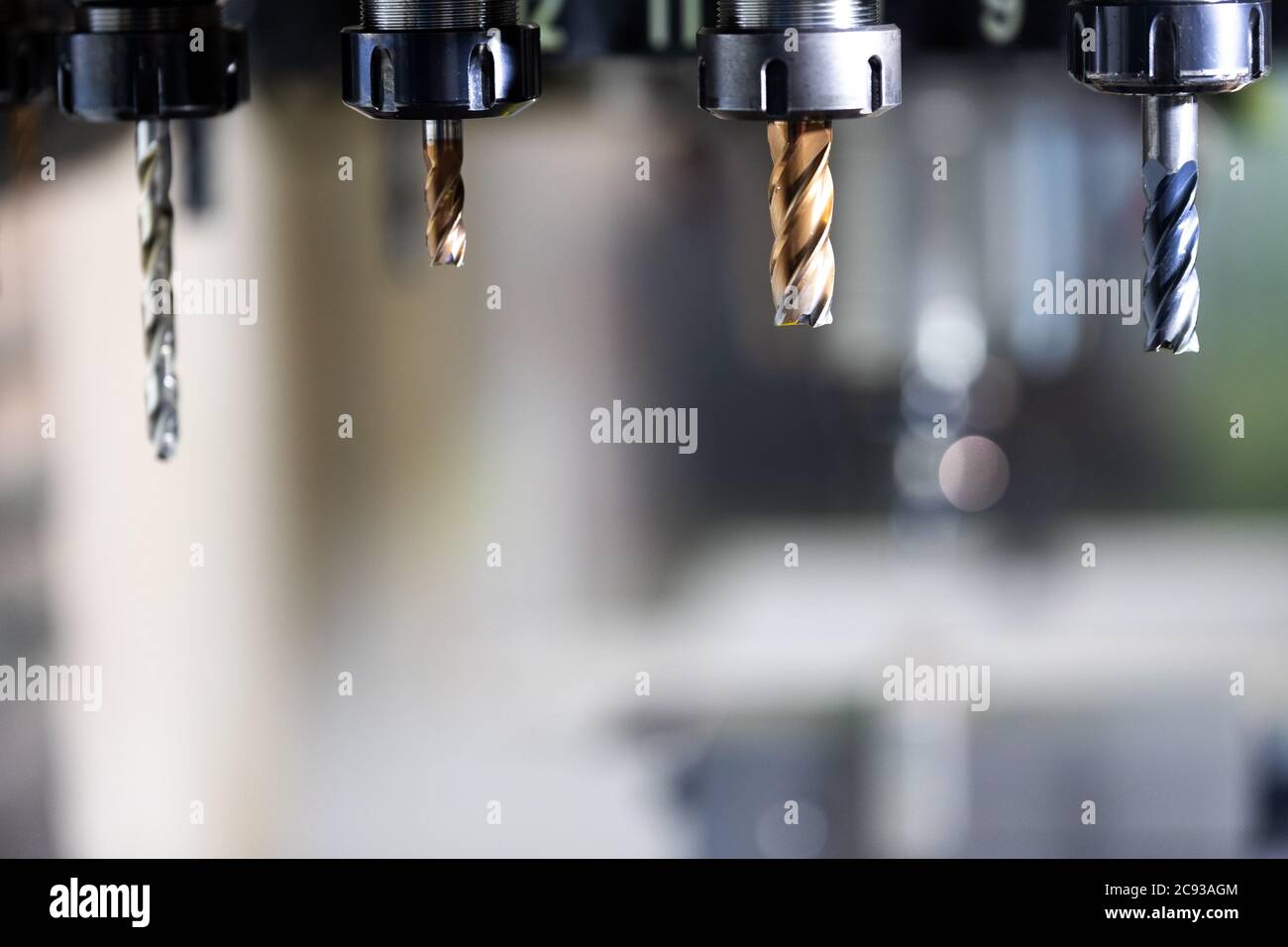 Heap of finished metal drill tools with protective coating Stock Photo ...