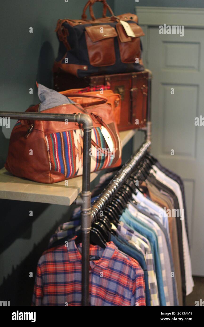 Vertical shot of inside a men's clothing store Stock Photo - Alamy