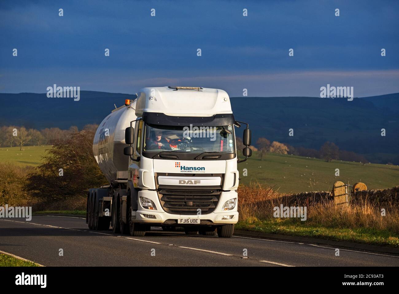 Hanson Group DAF truck pulling a dry powder tanker driving along an A ...