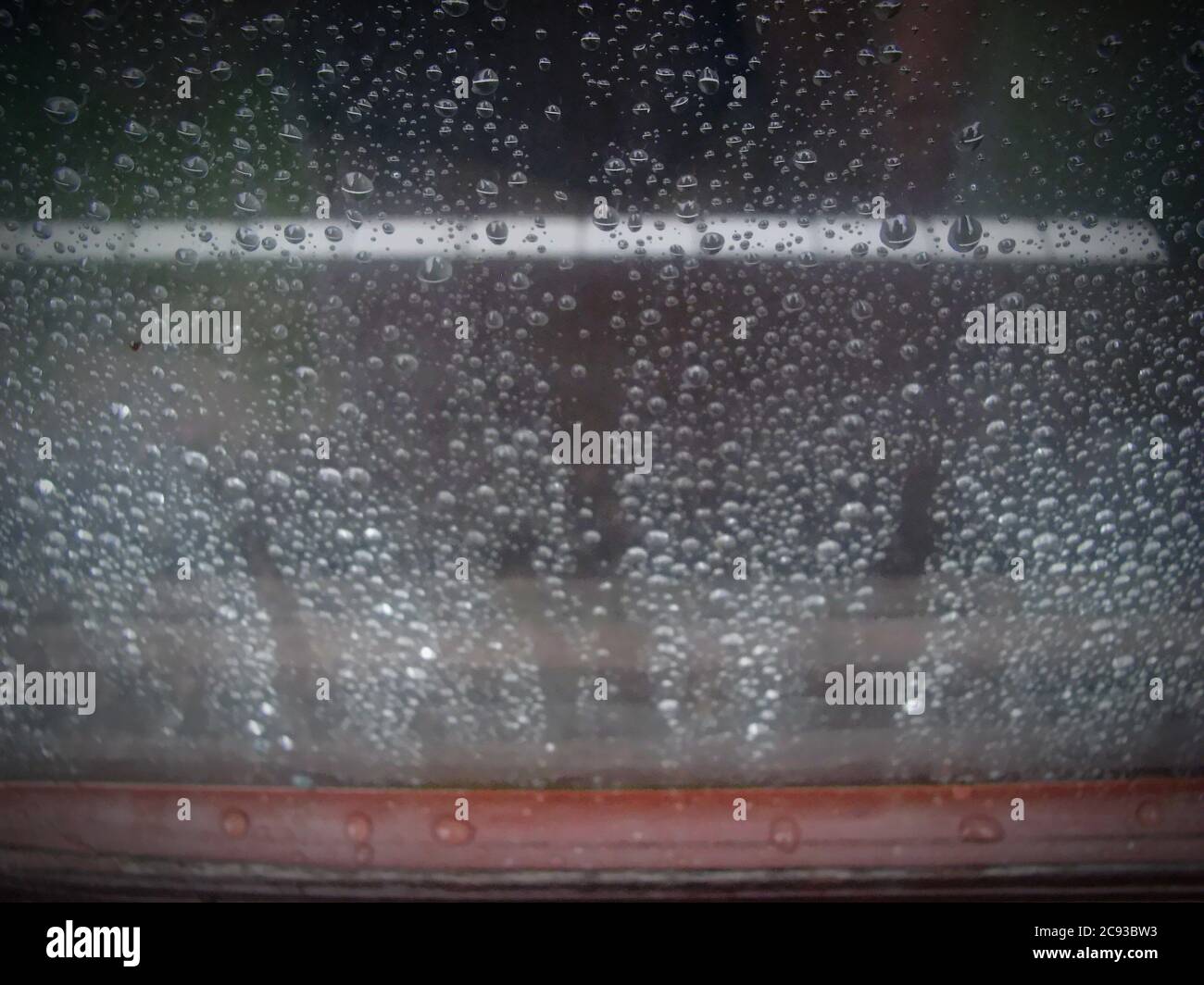 Window with raindrops on it Stock Photo - Alamy