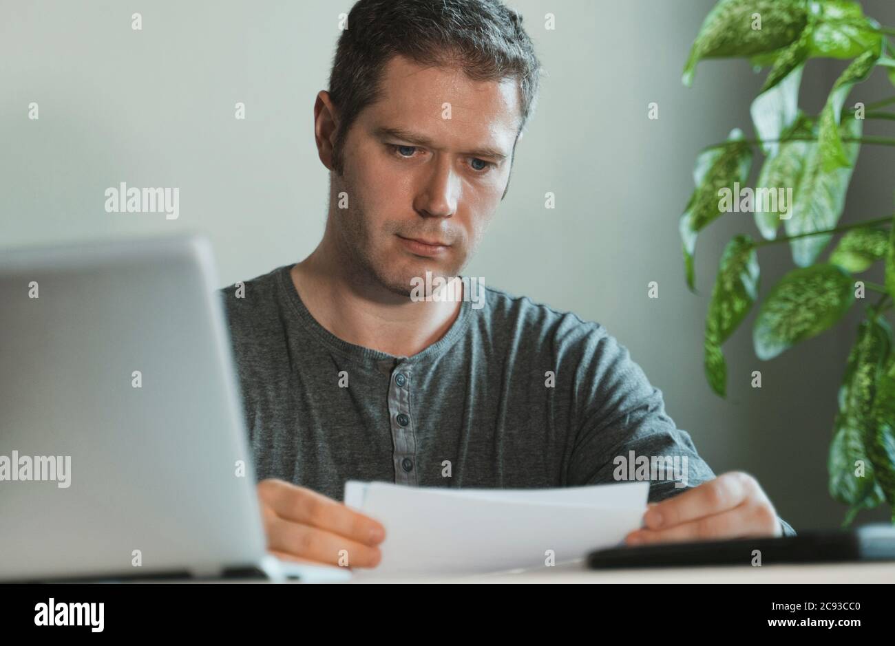 Working with papers hi-res stock photography and images - Alamy