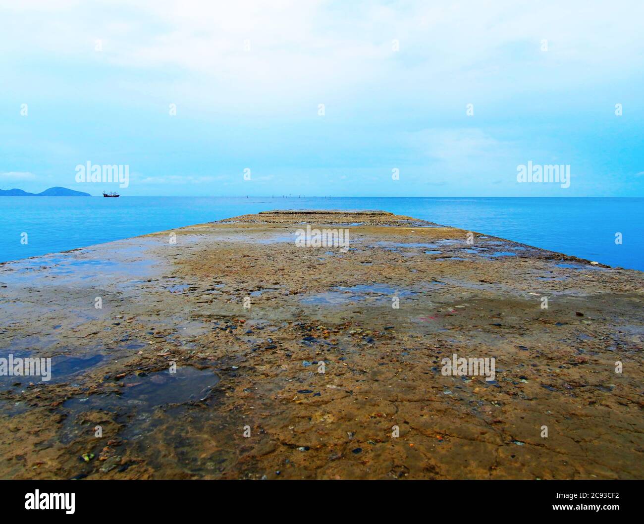 Flooded stone sinking into the sea Stock Photo - Alamy