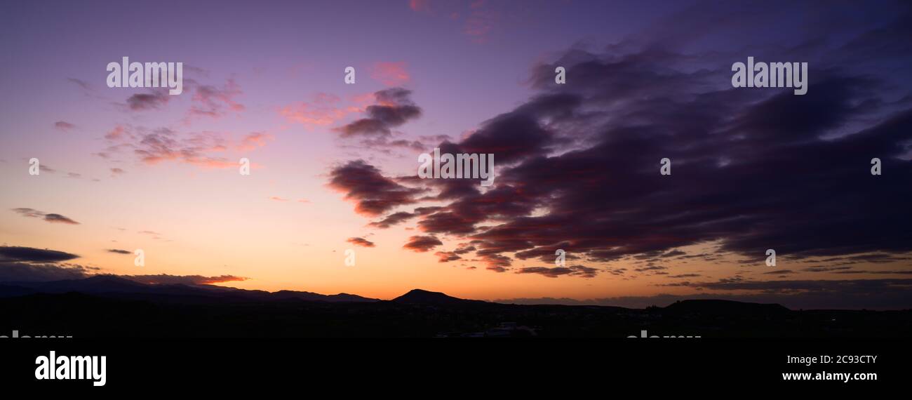 Mesmerizing shot of the beautiful sky during sunset Stock Photo - Alamy