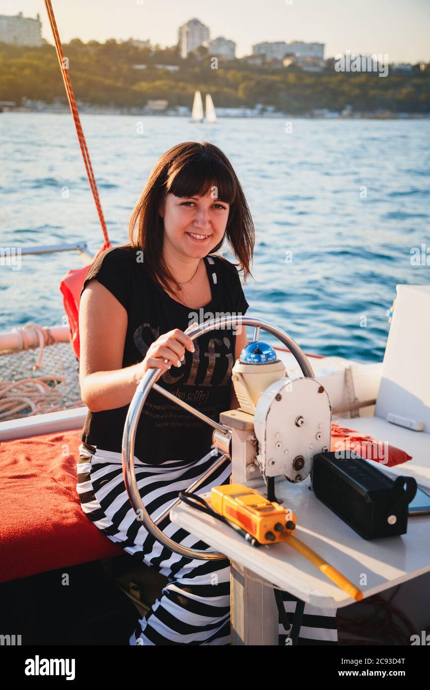 Female Driving Boat High Resolution Stock Photography and Images - Alamy