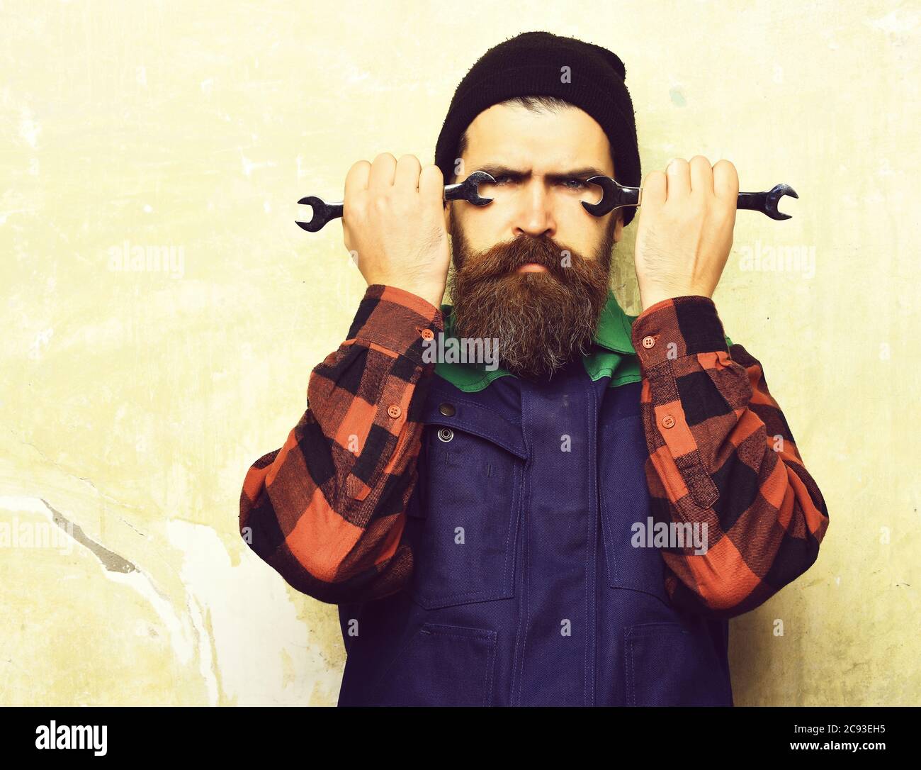 Bearded man, long beard. Brutal caucasian mechanic, unshaven hipster in ...