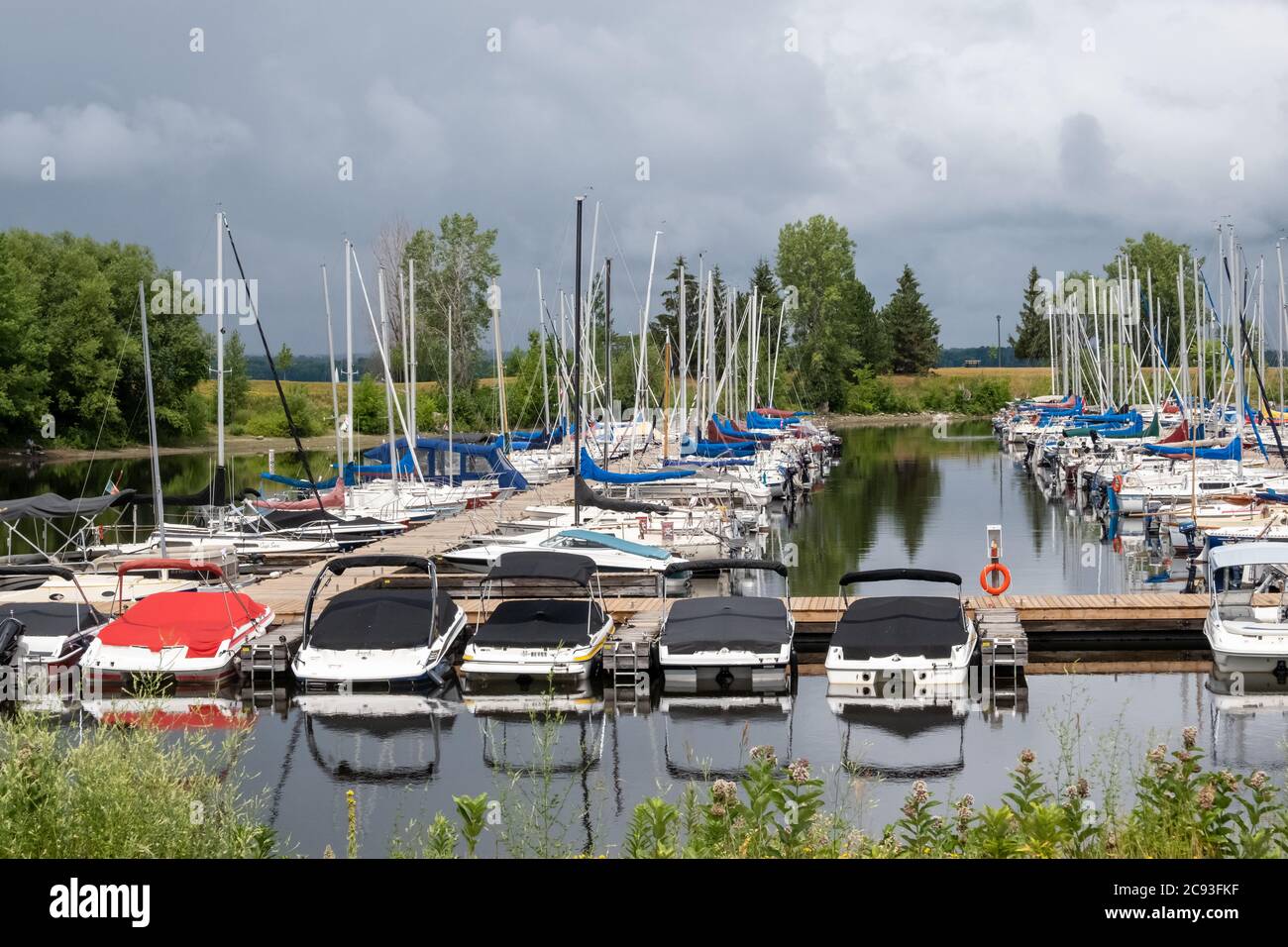 Boats, including motorboats and sailboats, are docked at the Nepean ...