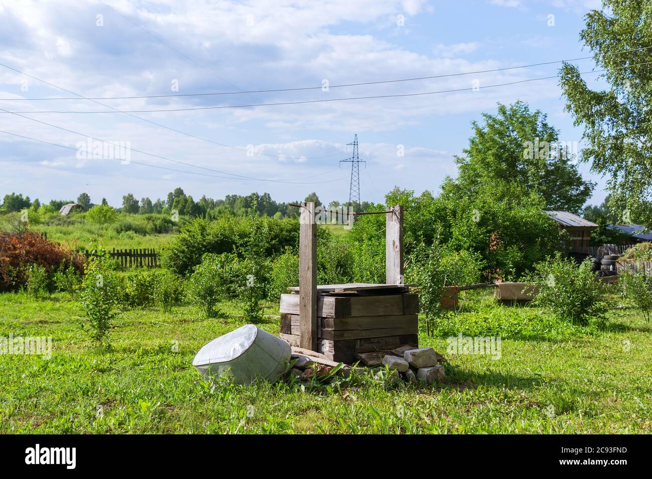 old water well. Wooden water well in village Stock Photo - Alamy
