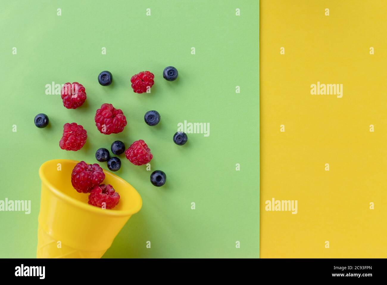 Explosion of different berries. Flat lay with blueberry and raspberry ...