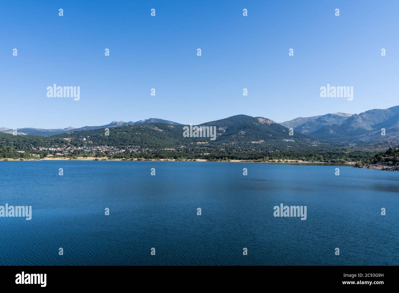Panoramic view of the lake from a reservoir surrounded by green ...