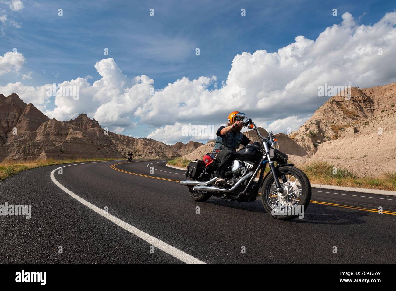 Badlands National Park, South Dakota - August 9, 2014: Bikers riding ...