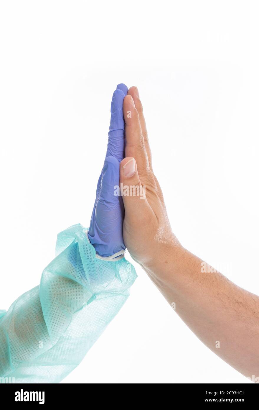 Doctor's hand reaching out to a patient's hand - doctors' efforts in ...